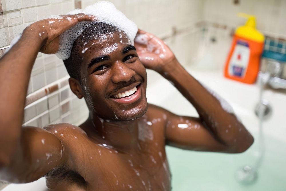 happy black guy washing hair | Free Photo - rawpixel