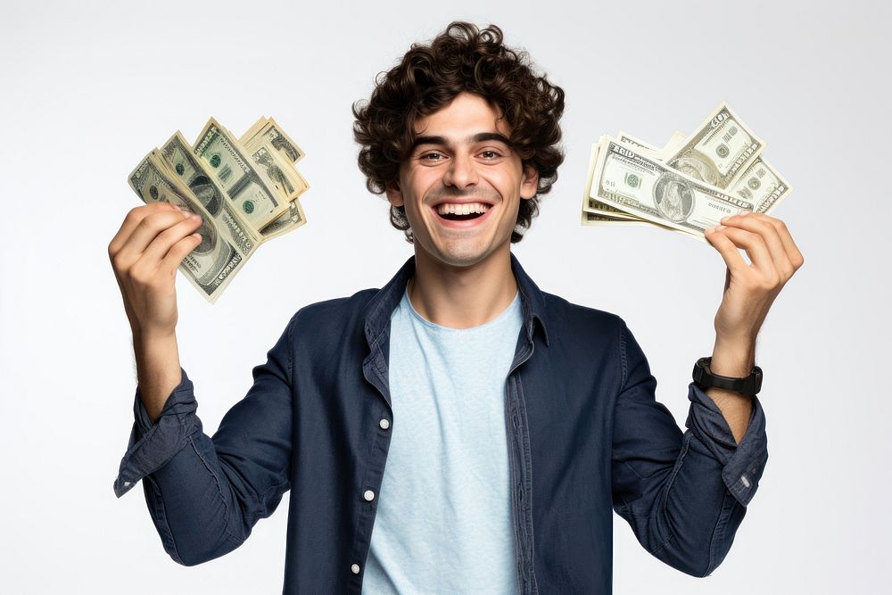 Young man holding money banknotes | Premium Photo - rawpixel