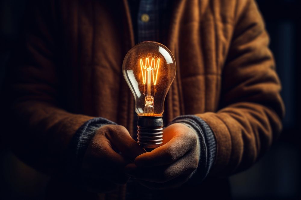 Person holding light bulb lightbulb | Premium Photo - rawpixel