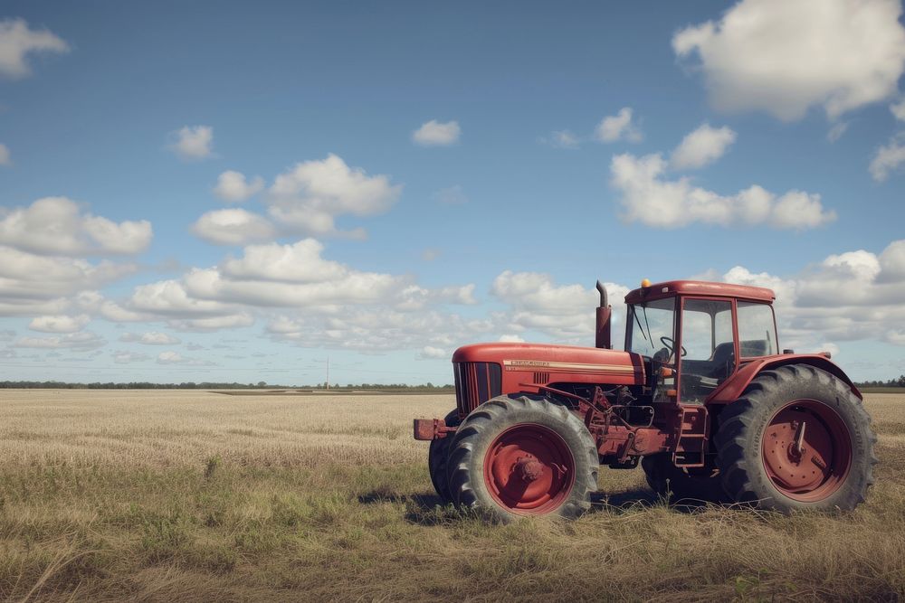 Red tractor field sunny day | Premium Photo - rawpixel