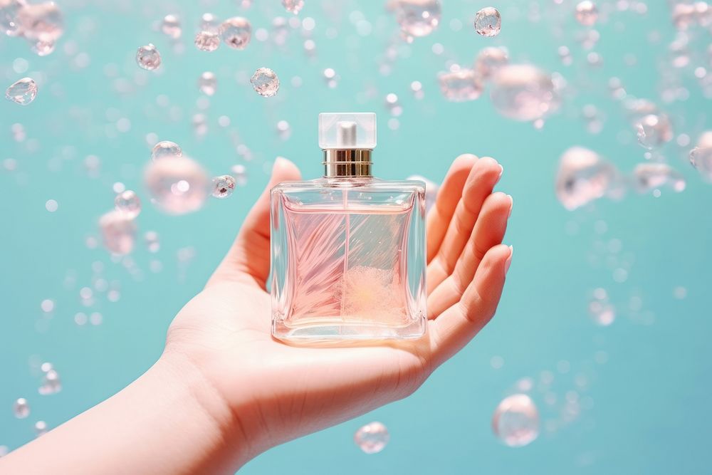 Hand holding perfume bottle cosmetics | Free Photo - rawpixel