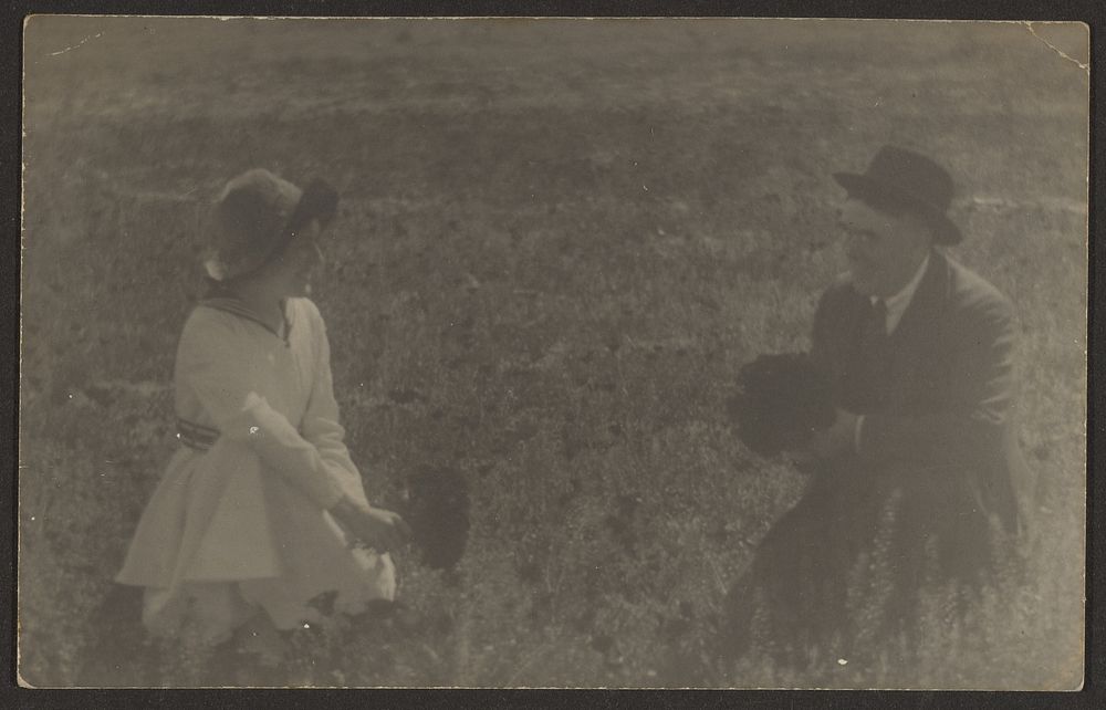 Fleckenstein and Daughter Sitting Field | Free Photo - rawpixel