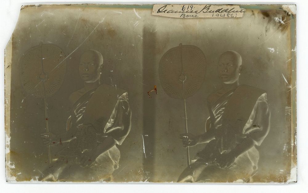 Thai monk holding fan. Photograph | Free Photo - rawpixel