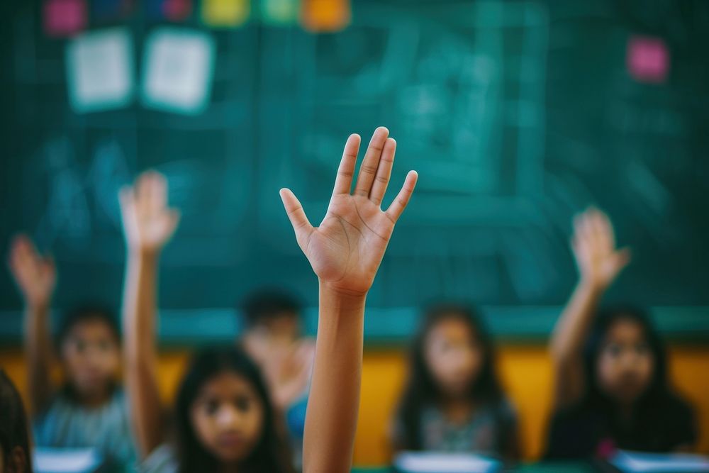 Extreme close student raising hands | Free Photo - rawpixel