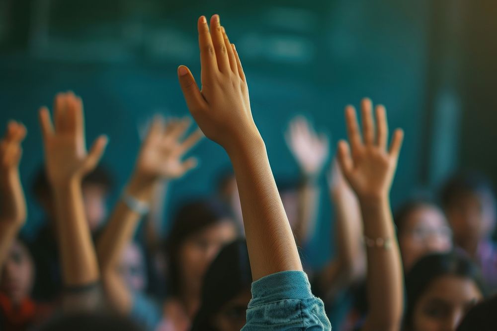 Extreme close student raising hands | Premium Photo - rawpixel