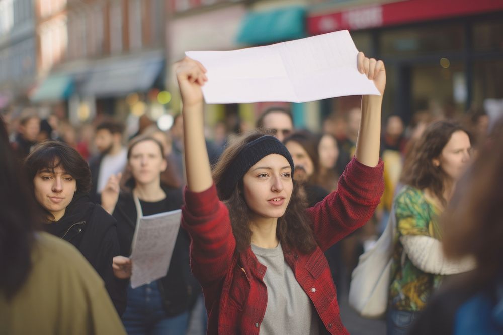 Hand holding flash mob paper | Free Photo - rawpixel