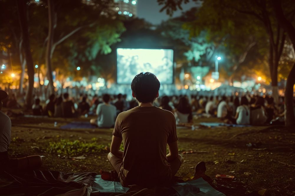 People watching outdoor movie outdoors | Free Photo - rawpixel