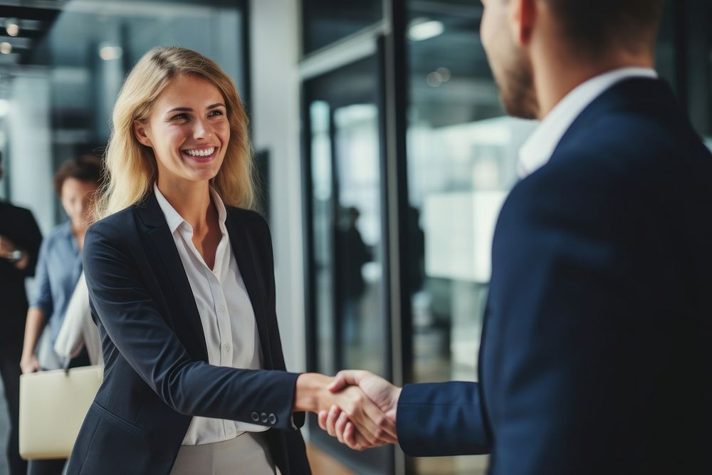 Smiling businesswoman greeting office adult | Premium Photo - rawpixel