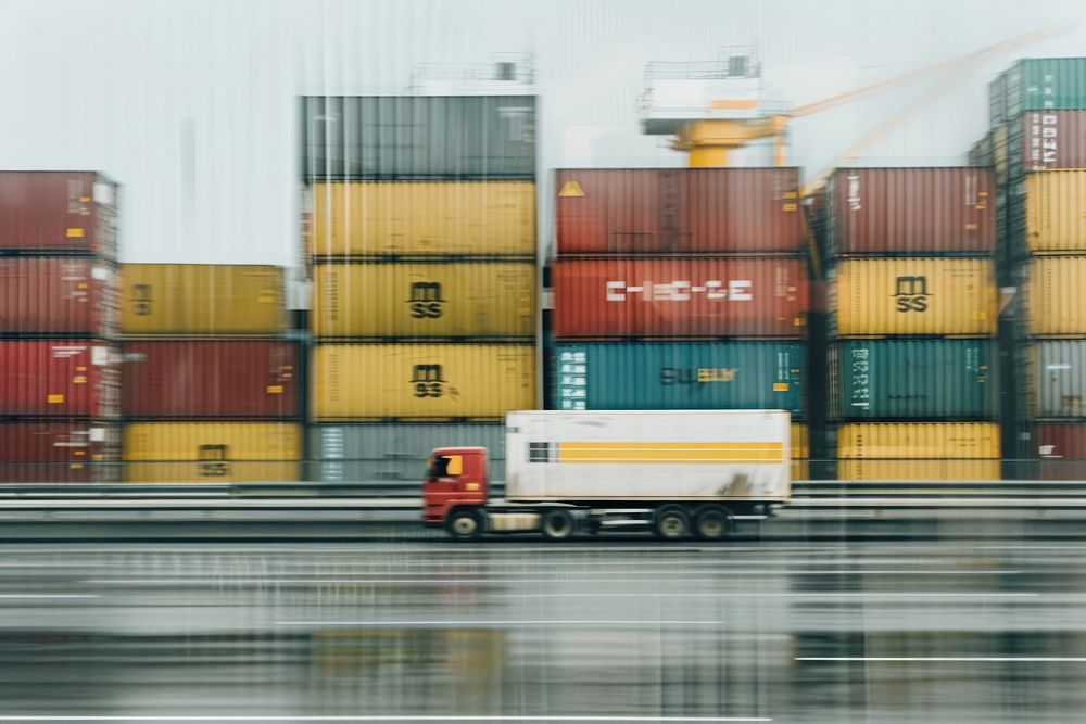 Truck moves container shipping vehicle. | Premium Photo - rawpixel