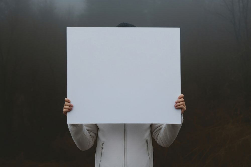 Person holding placard photo photography | Free Photo - rawpixel