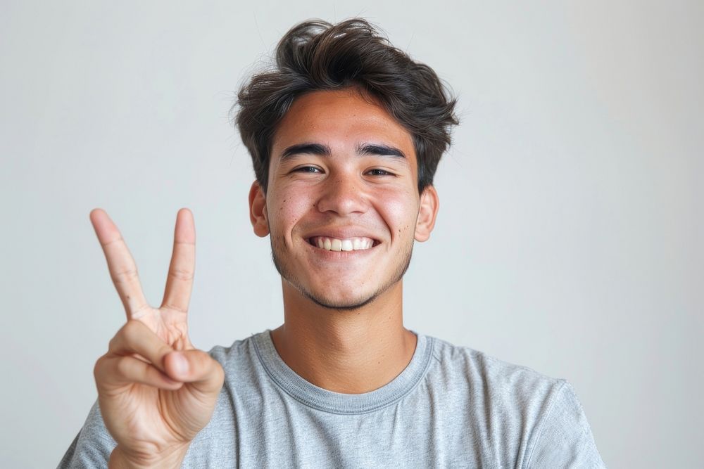 Person making peace sign cheerful | Free Photo - rawpixel