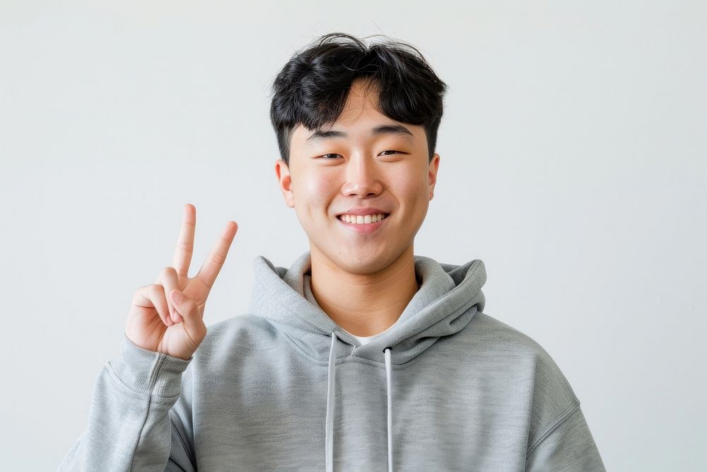 Person making peace sign portrait | Free Photo - rawpixel