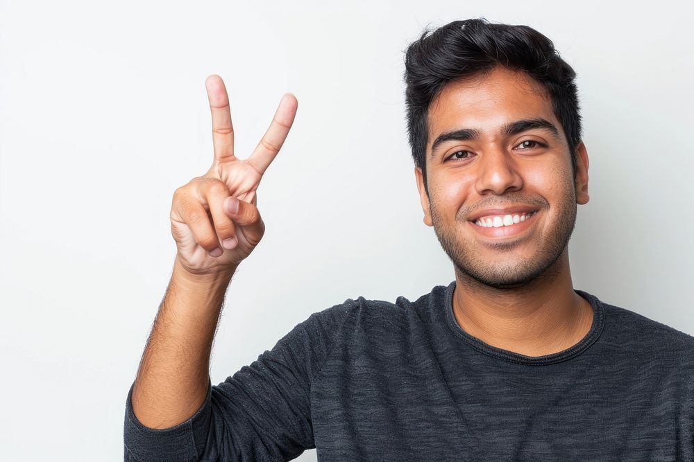 Person making peace sign portrait | Free Photo - rawpixel