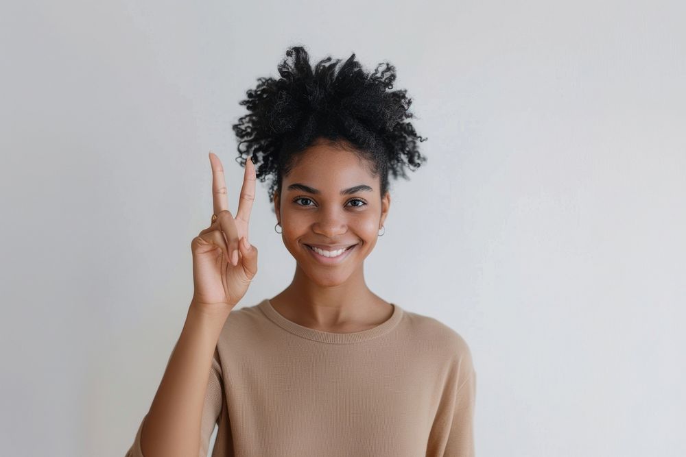 Person making peace sign cheerful | Free Photo - rawpixel