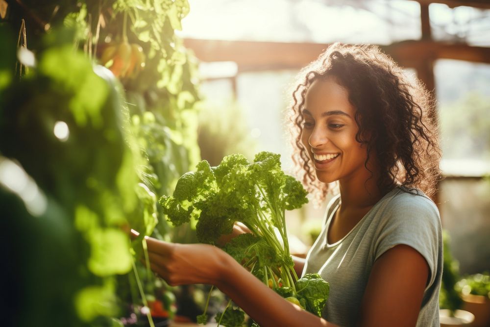 woman picking fresh vegetable greenhouse | Free Photo - rawpixel