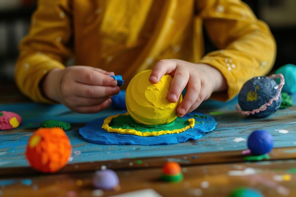 Kid making plasticine person human | Free Photo - rawpixel