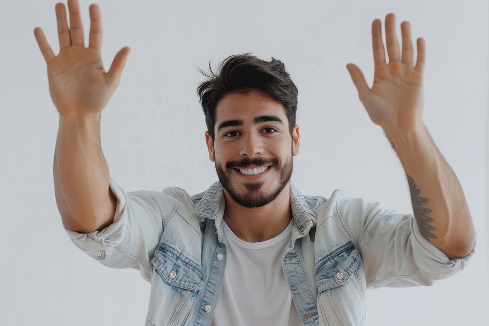Adult hispanic man waving hand | Free Photo - rawpixel