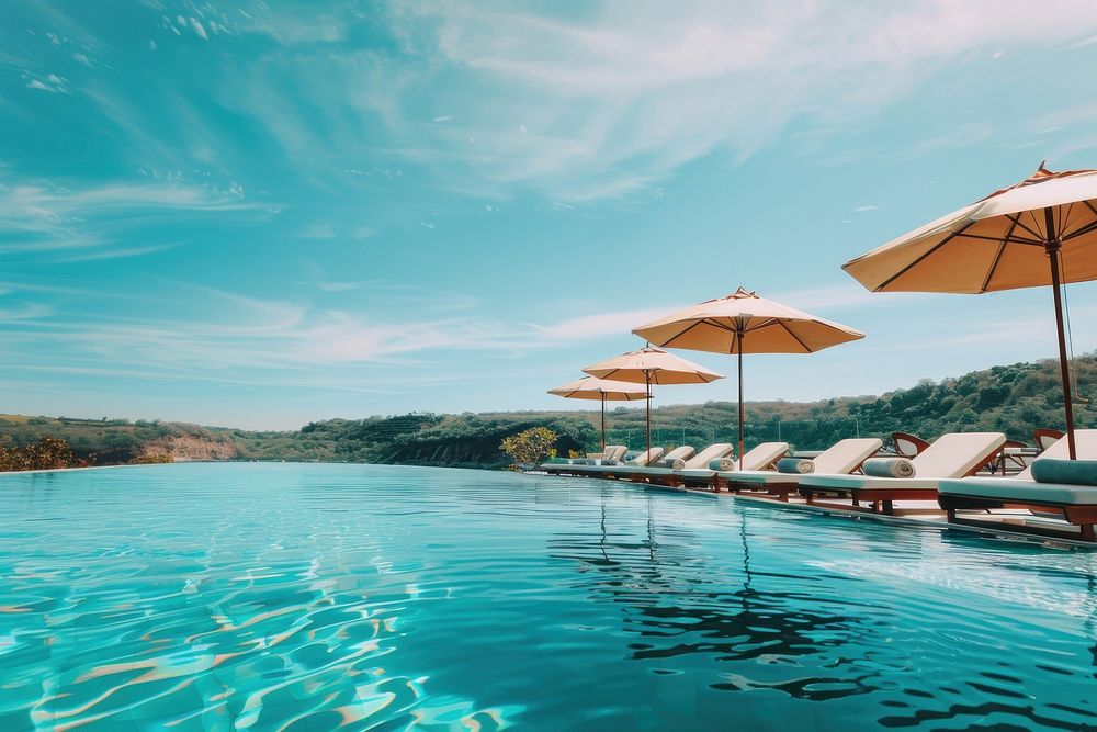 modern hotel pool chair sea | Premium Photo - rawpixel