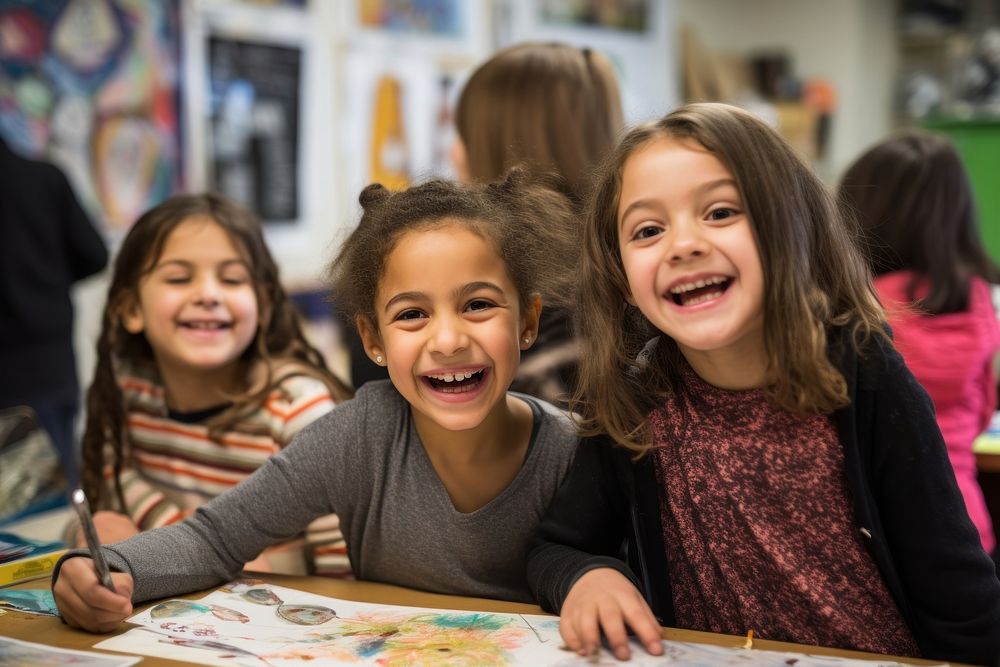 Happy kid drawing pictures laughing | Free Photo - rawpixel