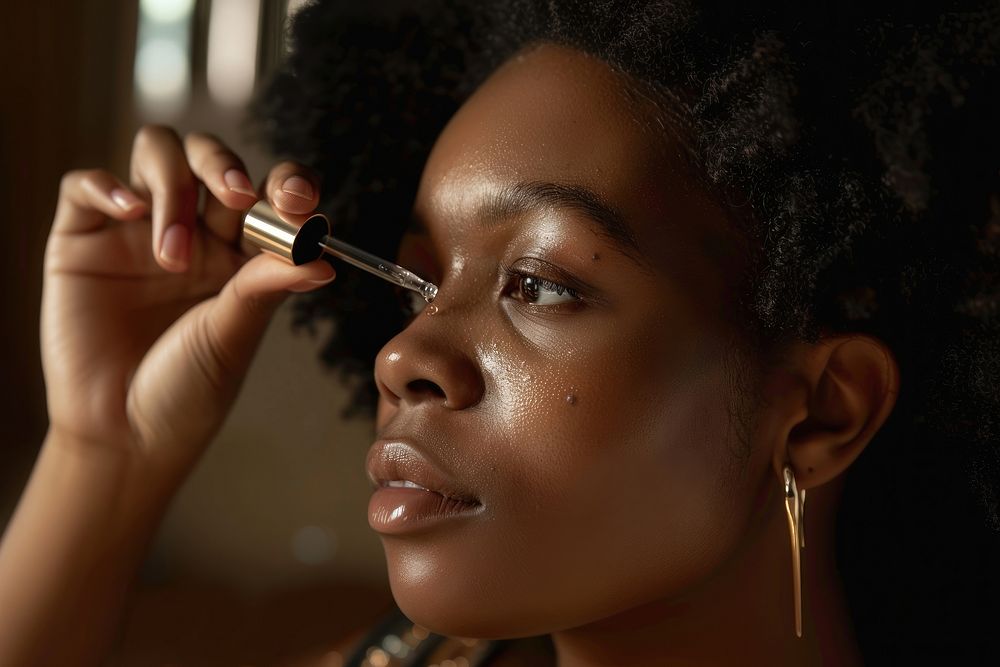 Woman face applying serum cosmetics | Free Photo - rawpixel