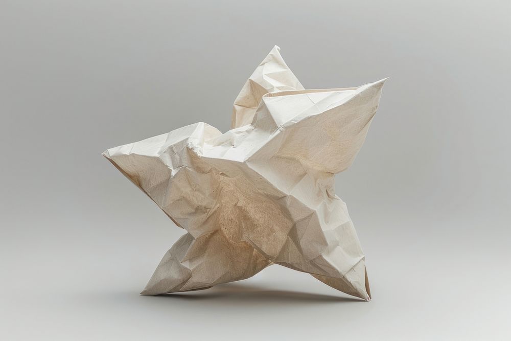 Star style crumpled paper origami | Free Photo - rawpixel