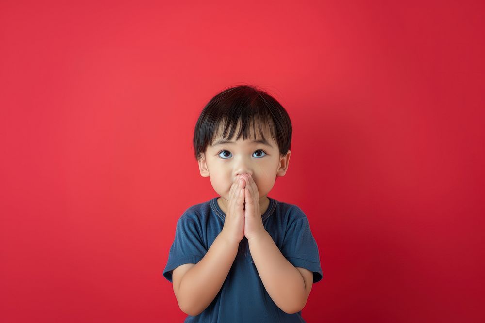 Asian child apology hands surprised | Premium Photo - rawpixel