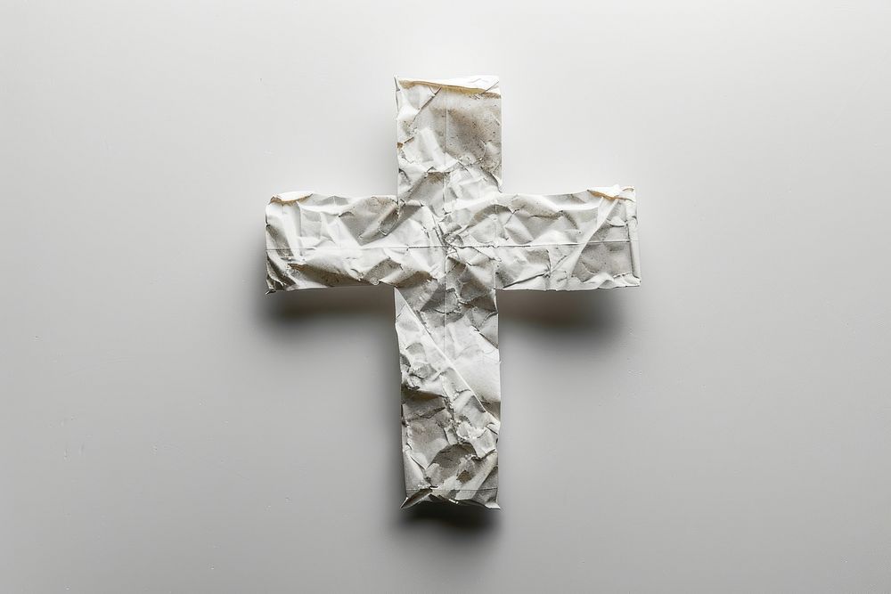 Cross style crumpled crucifix symbol. | Premium Photo - rawpixel