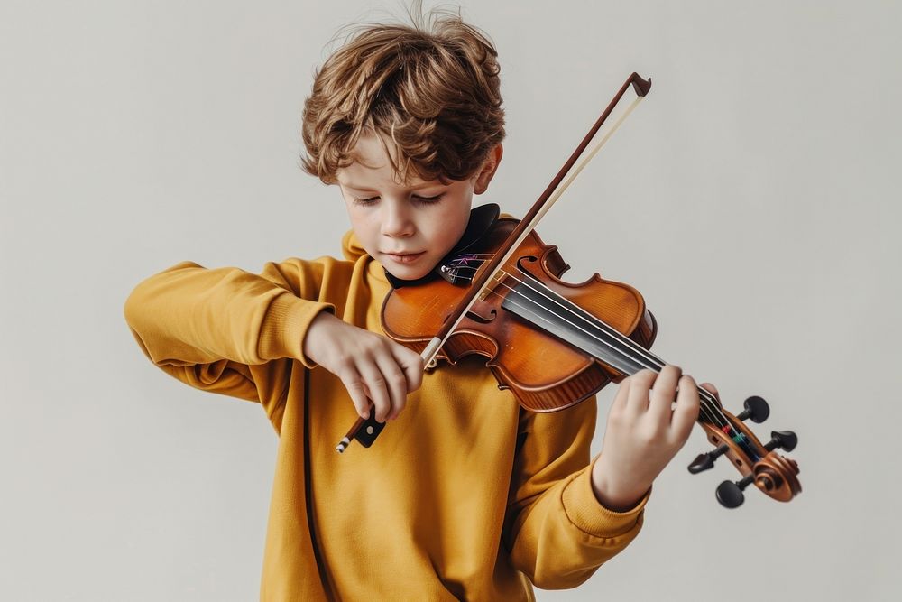 Kid playing violin kid performer | Free Photo - rawpixel