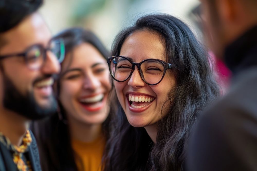 4 colleagues sharing light moment | Free Photo - rawpixel