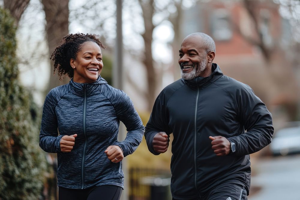 Happy couple jogging outdoors together. | Free Photo - rawpixel