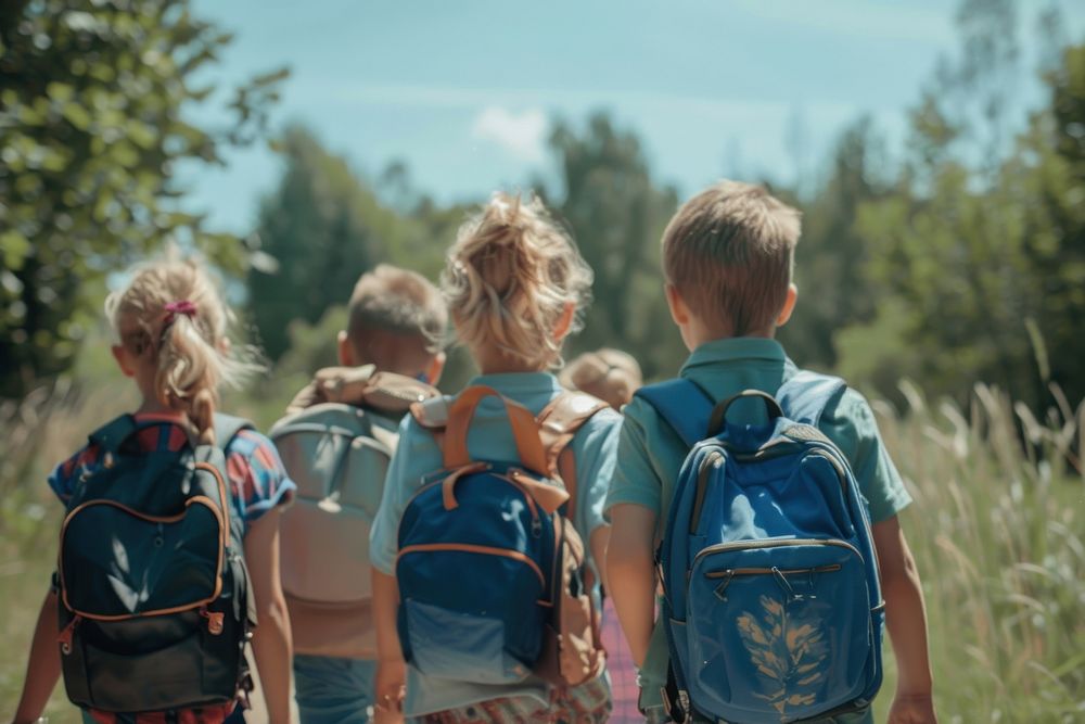 Young children walking together backpacks | Free Photo - rawpixel