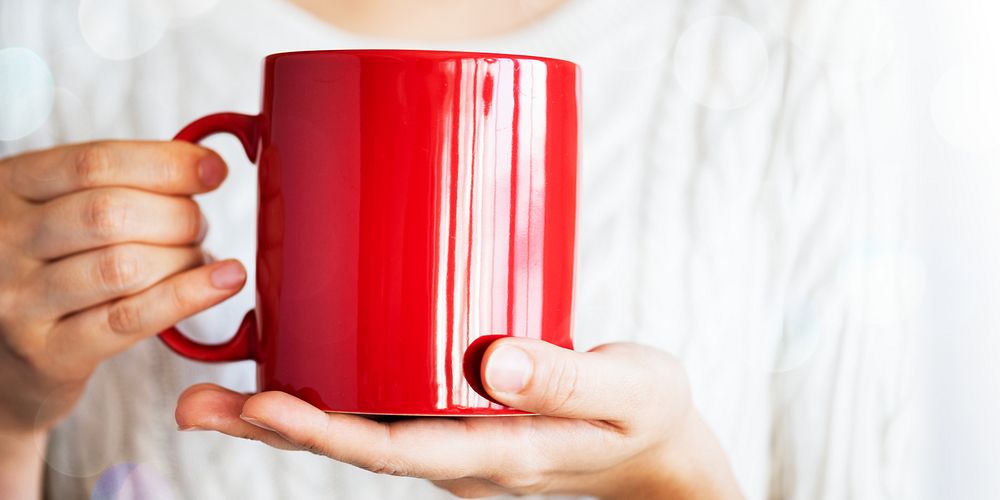 Close-up hands holding red mug. | Free Photo - rawpixel