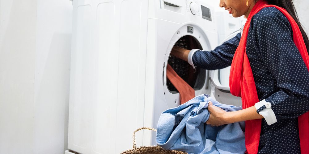 Indian woman doing laundry, placing | Free Photo - rawpixel