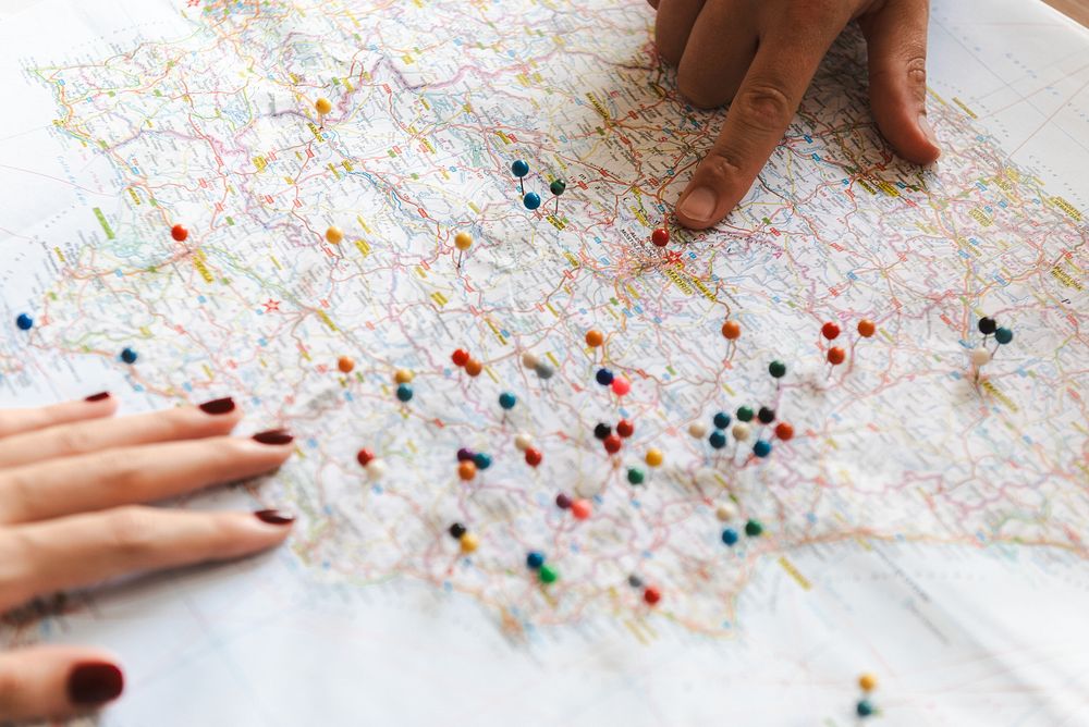 Hands pointing world map colorful | Free Photo - rawpixel