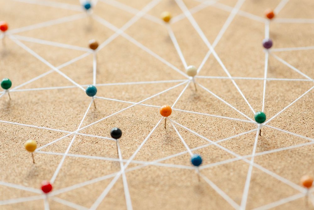 Colorful pins connected string corkboard. | Free Photo - rawpixel