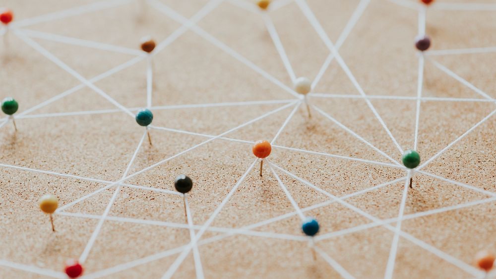 Colorful pins connected strings corkboard. | Free Photo - rawpixel