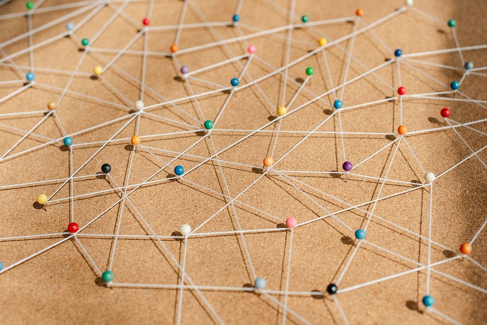 Colorful pins connected strings corkboard. | Free Photo - rawpixel