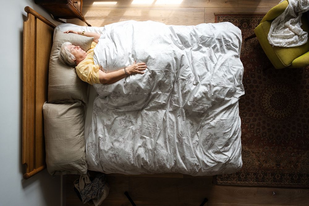 Elderly woman sleeping peacefully bed, | Free Photo - rawpixel