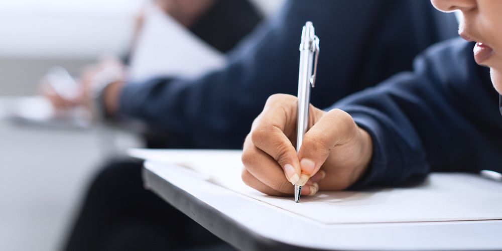 Close-up person writing pen paper. | Premium Photo - rawpixel