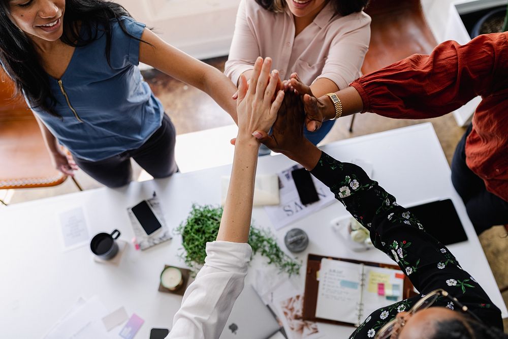 Diverse group women joining hands | Premium Photo - rawpixel
