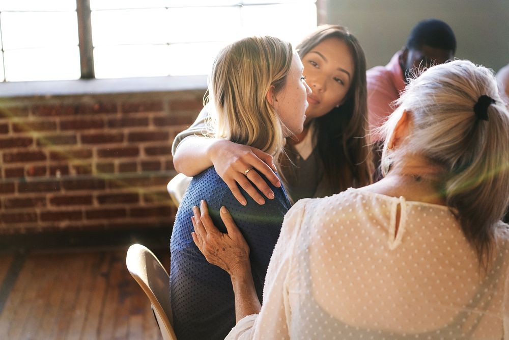 comforting scene three women sitting | Free Photo - rawpixel