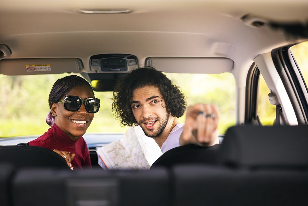 Two people car, looking back. | Premium Photo - rawpixel