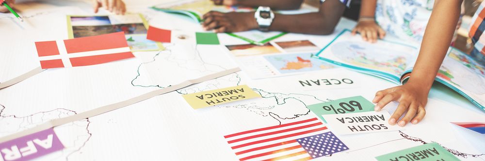 Children exploring world map flags | Free Photo - rawpixel