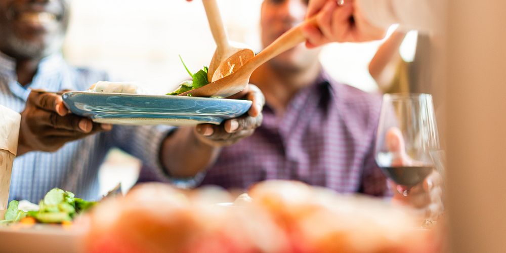 diverse group shares meal, passing | Free Photo - rawpixel