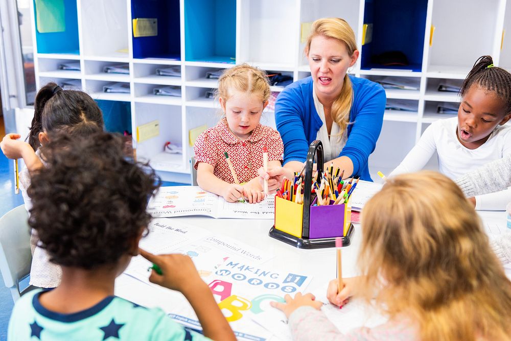 Children and teacher classroom, engaged | Free Photo - rawpixel