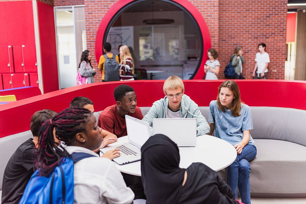 Diverse group students collaborating modern | Free Photo - rawpixel