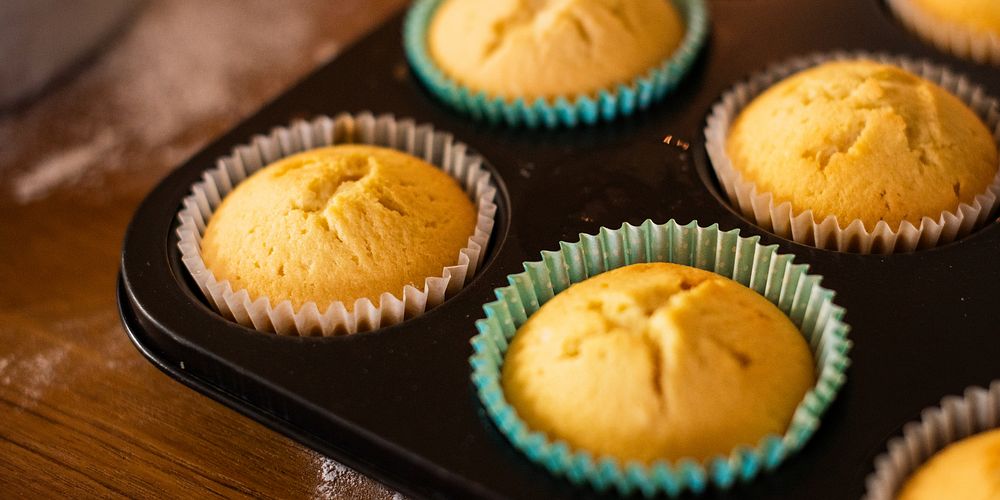 Freshly baked cupcakes tray, golden | Premium Photo - rawpixel