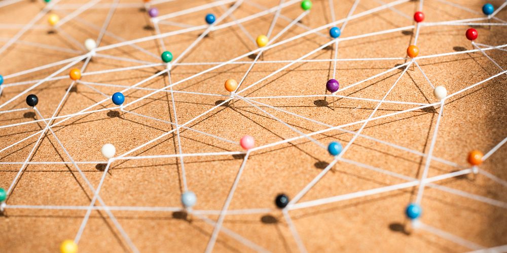 Colorful pins and strings form | Free Photo - rawpixel