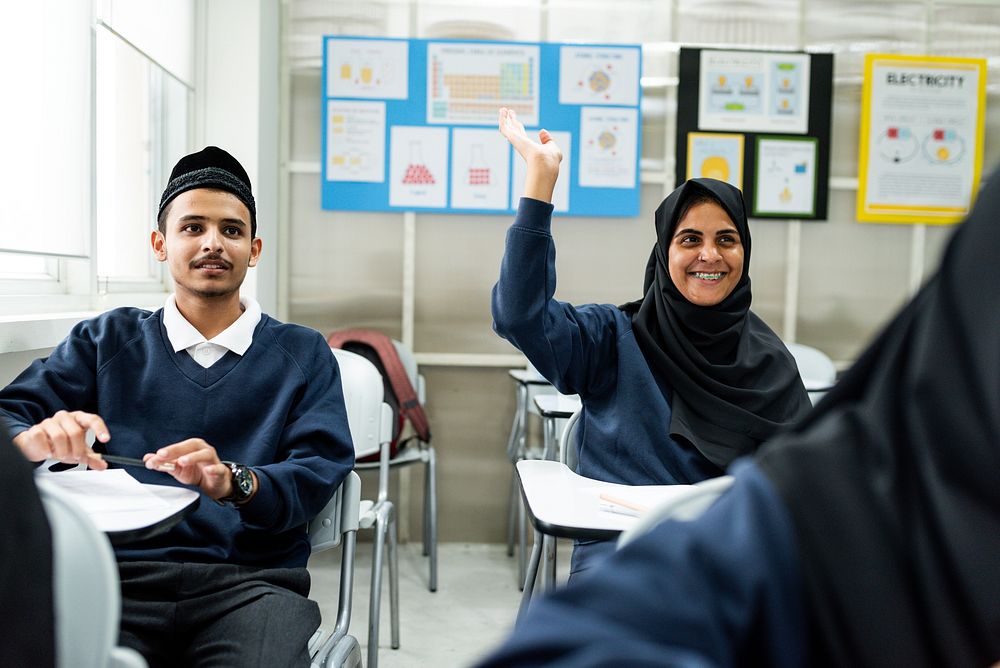 Muslim students classroom, one raising | Free Photo - rawpixel