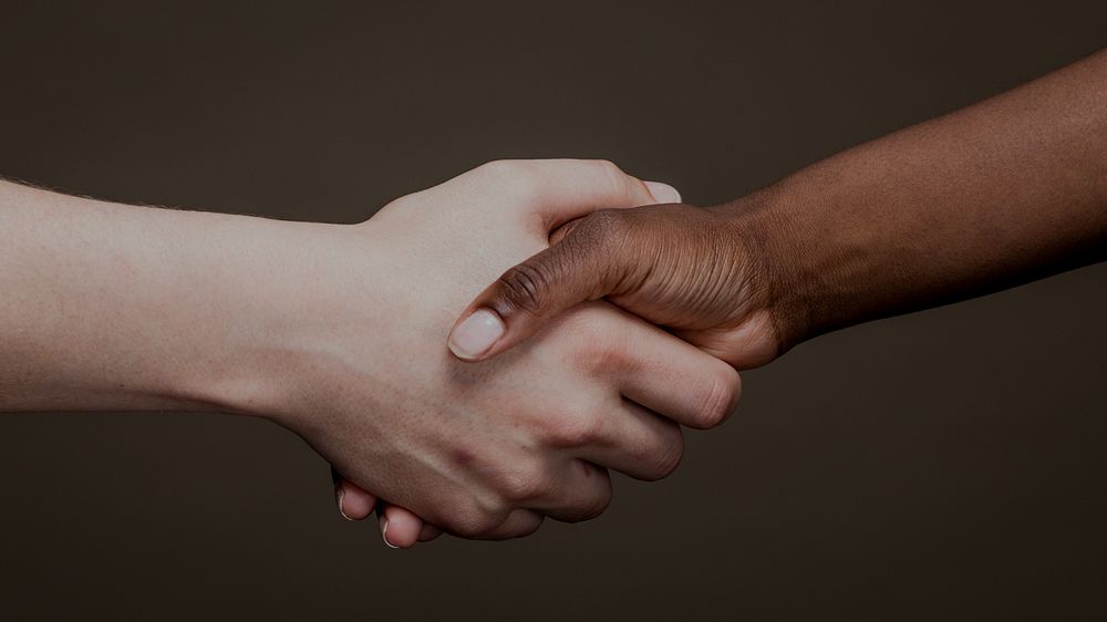 Close-up handshake two people different | Free Photo - rawpixel